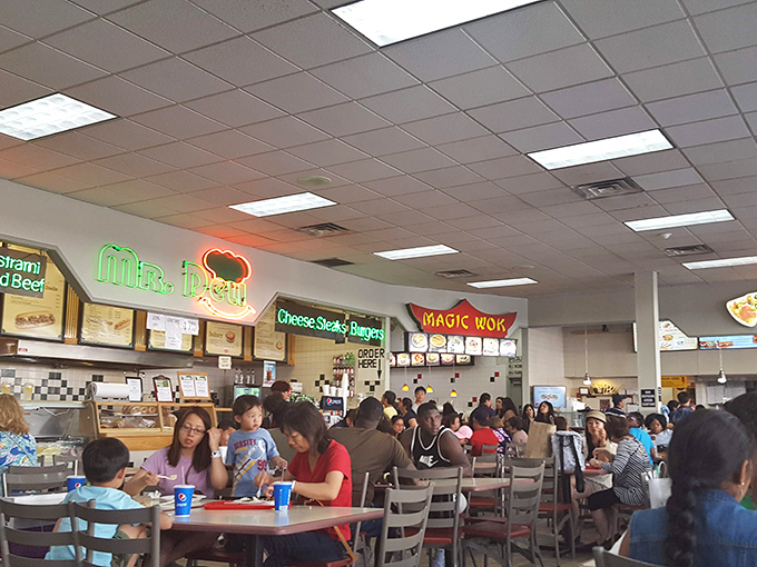 The food court buzzes with shoppers refueling for round two. Where bargain hunters gather to compare spoils and strategize their next retail conquest.
