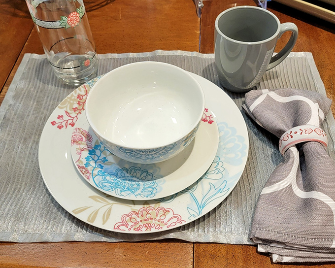 Delicate florals meet modern design in this table setting. The kind of dishware that makes even takeout feel like a special occasion.