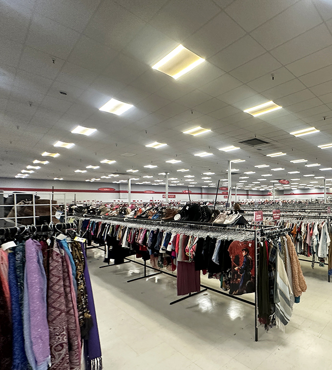 A sea of clothing racks that would make Marie Kondo simultaneously faint and feel professionally challenged.