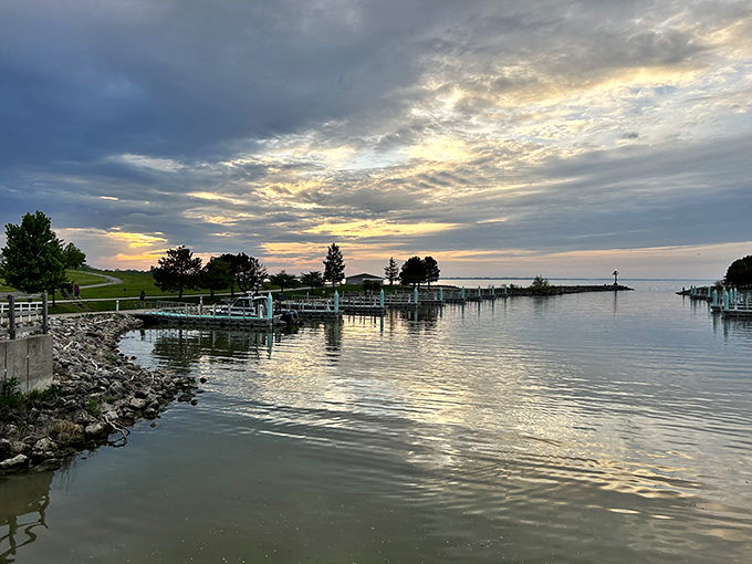 Golden hour transforms Maumee Bay's marina into a scene worthy of a postcard. Sunsets here make even non-photographers reach for their phones.