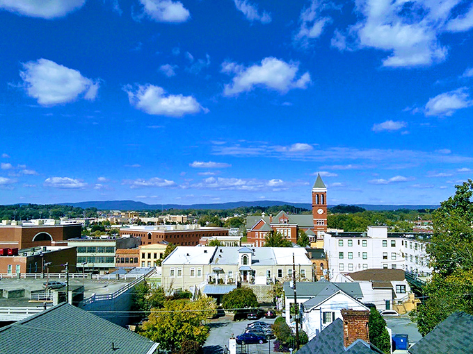 From this vantage point, Rome reveals itself as a patchwork quilt of history, with church spires reaching skyward as if to touch those perfect Georgia clouds.