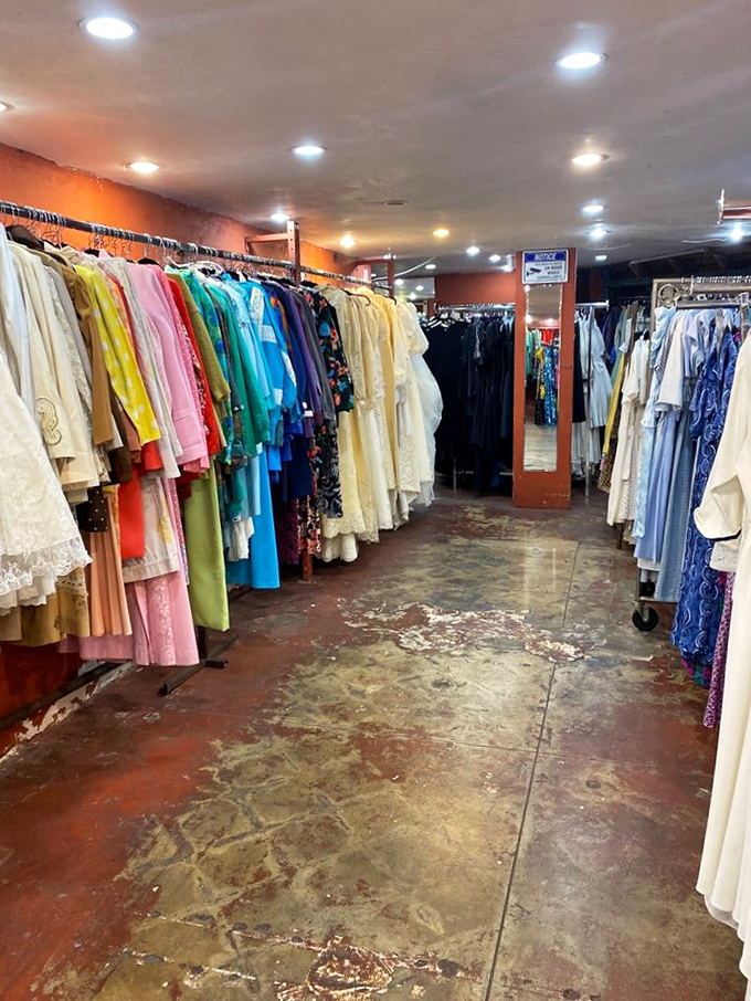 Dresses hang like colorful promises of reinvention, each one waiting for its perfect second act.
