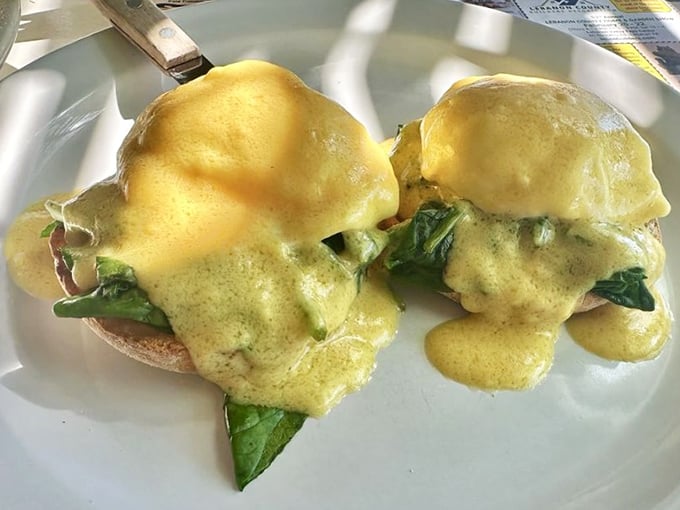 Eggs Benedict that would make the Pope himself convert to the Church of Breakfast, with hollandaise sauce smooth enough to write sonnets about.