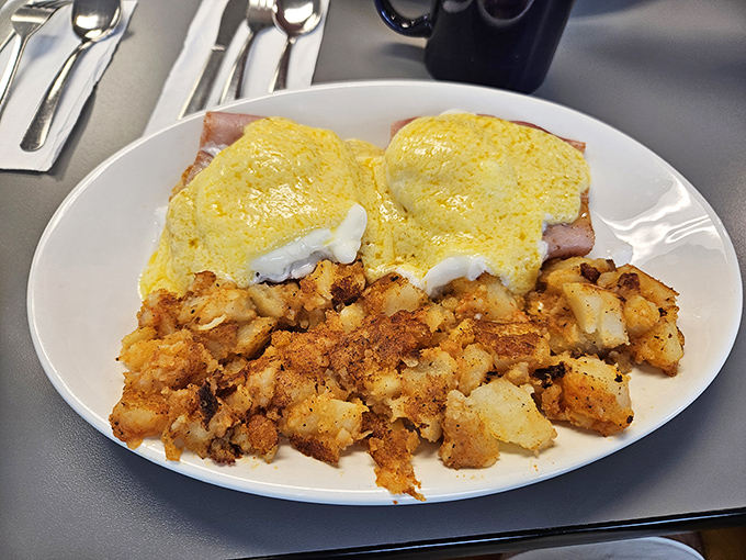 Eggs Benedict that would make the Pope himself convert to the Church of Breakfast, with hash browns that deserve their own hymn.