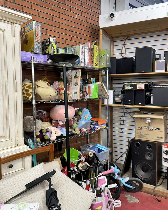 The electronics corner looks like the aftermath of a tech revolution, where yesterday's gadgets await their second chance at usefulness.