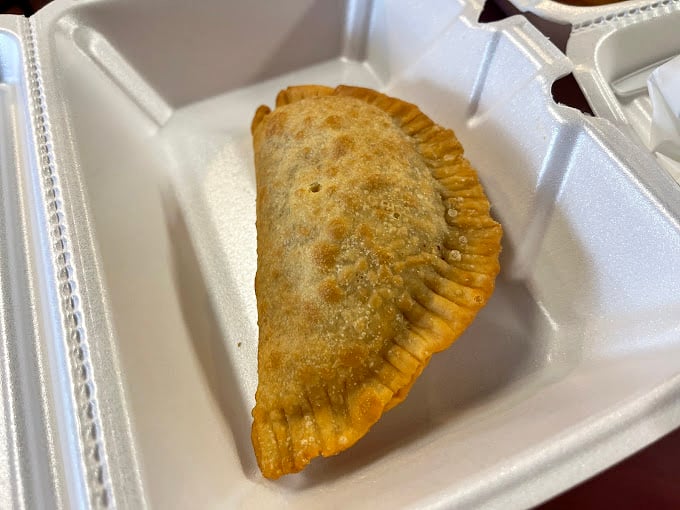 The humble empanada: proof that the best things come in simple packages. This hand-held delight delivers a perfect ratio of crispy exterior to savory filling.