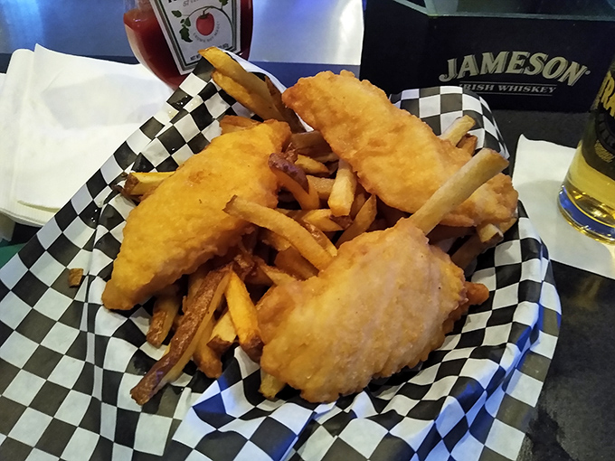 Fish and chips served in a checkered basket&mdash;the universal signal that you're about to experience something gloriously unpretentious and utterly satisfying.