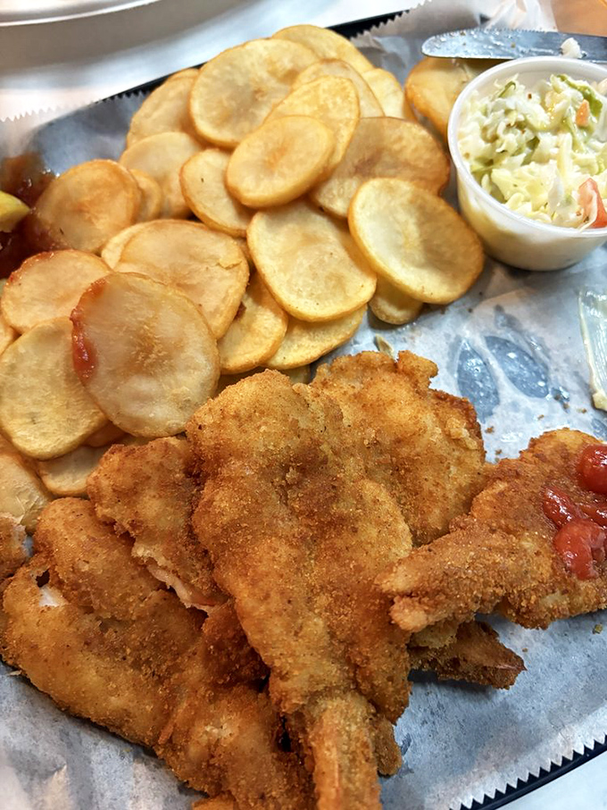 The star of the show&mdash;perfectly golden fried shrimp with homestyle chips and creamy slaw. Worth crossing county lines for this treasure.