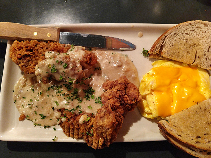 Country fried steak smothered in gravy alongside eggs that could make a rooster jealous. Comfort food that hugs your soul.
