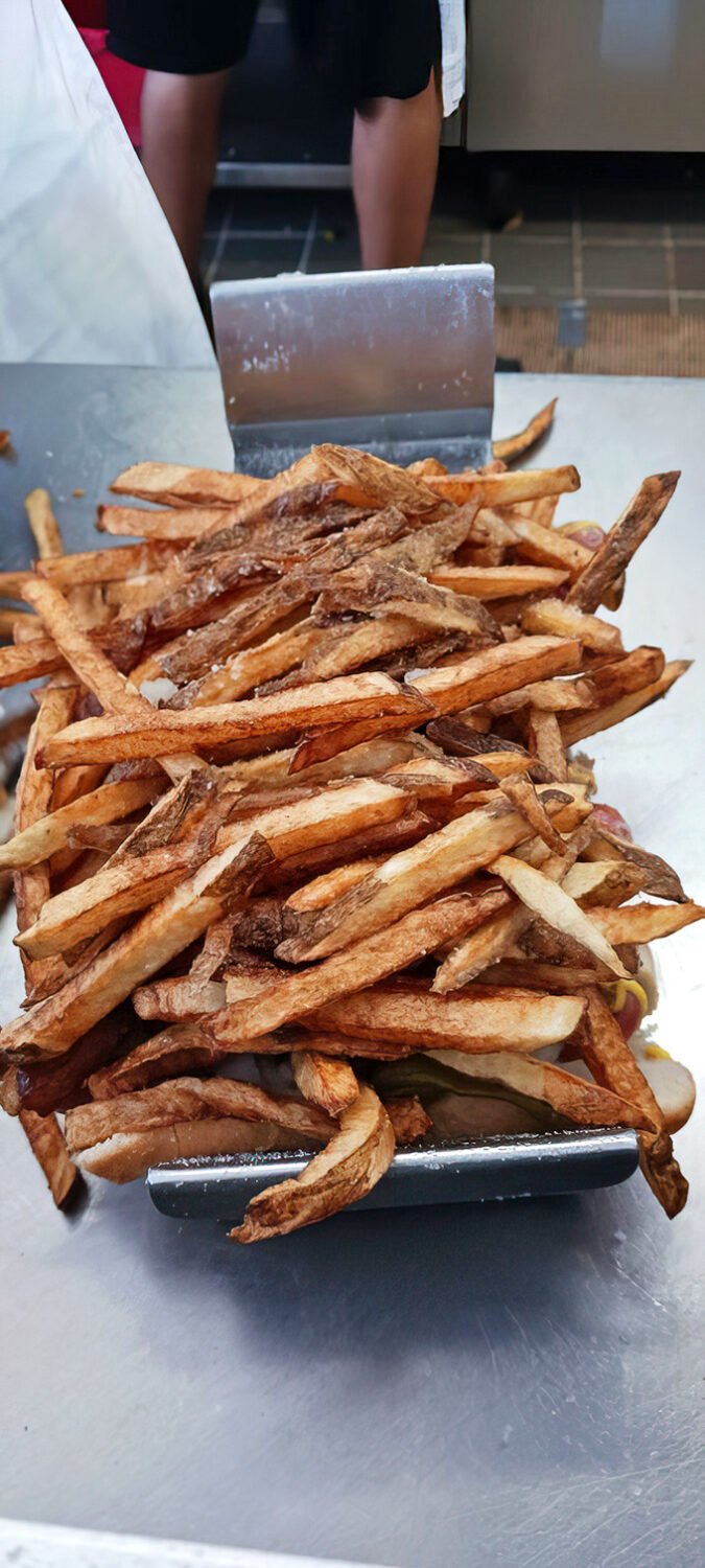 These hand-cut fries aren't just a side dish&mdash;they're the golden, crispy co-stars of the Gene & Jude's experience.