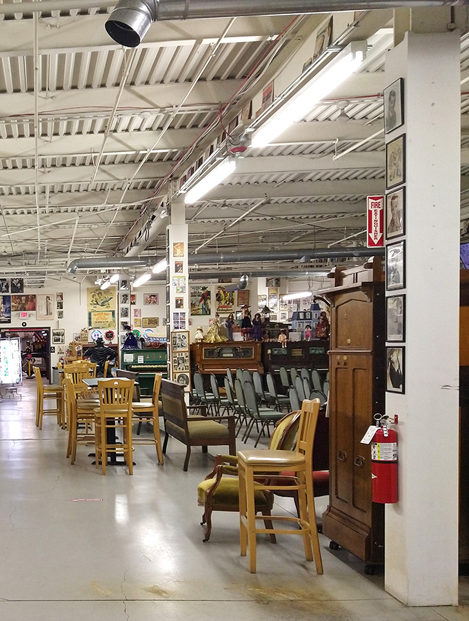 The music room awaits an audience. These vintage chairs have likely heard thousands of mechanical melodies over decades of delighted visitors.