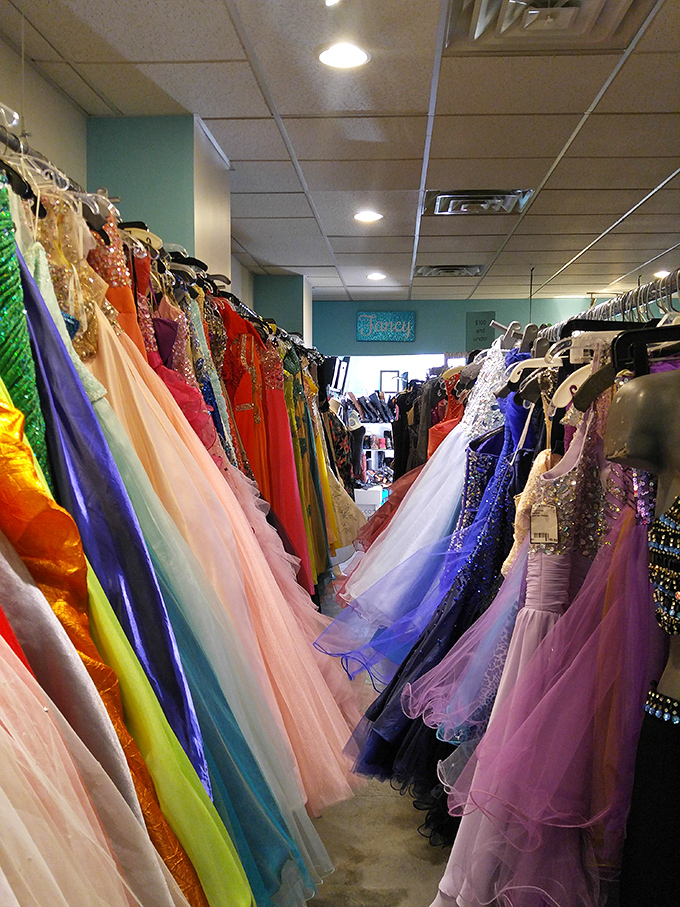 A kaleidoscope of formal gowns creates a magical tunnel of tulle and sequins—prom dreams without the nightmare price tags.