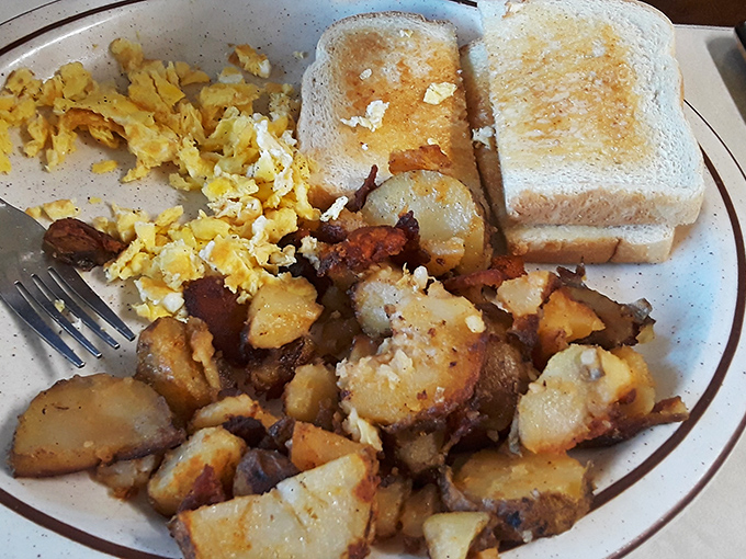 Home fries that actually taste like home&mdash;if home were a place where potatoes achieve crispy-outside, fluffy-inside perfection alongside eggs scrambled just right.