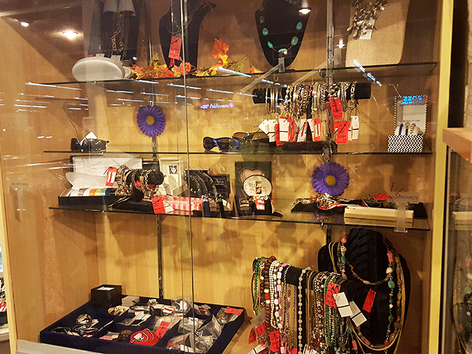 Behind glass, vintage costume jewelry awaits its second act. That turquoise necklace could be your next signature piece!