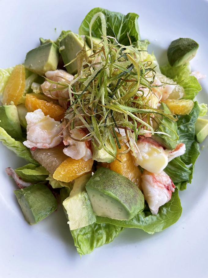 California sunshine on a plate – where buttery lobster mingles with avocado and citrus in a salad that makes eating greens feel like cheating.