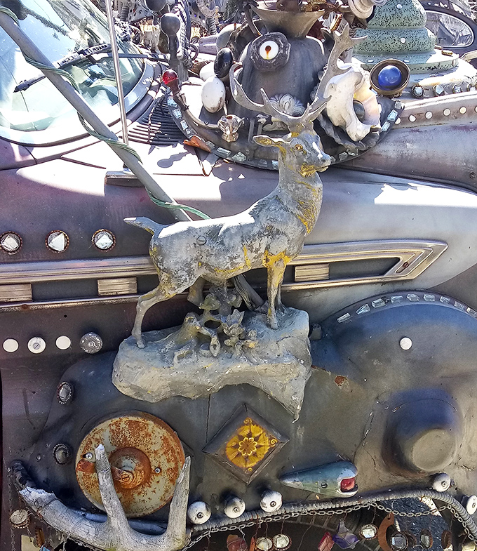 This weathered deer stands proudly atop its mechanical kingdom. Bambi meets Blade Runner in this post-apocalyptic pastoral scene.