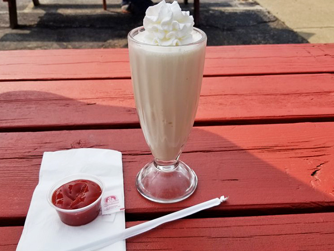 A proper milkshake requires proper respect: served in a tall glass with whipped cream on top and ketchup standing by for the inevitable burger.