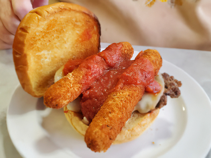 The mozzarella sticks burger&mdash;where someone dared to ask, "What if we combined two perfect foods?" and created something greater than the sum of its parts.