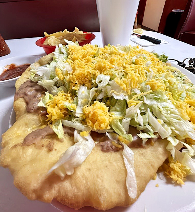 The Navajo Taco arrives like an edible monument &ndash; fry bread supporting a skyscraper of beans, cheese, lettuce and pure happiness.