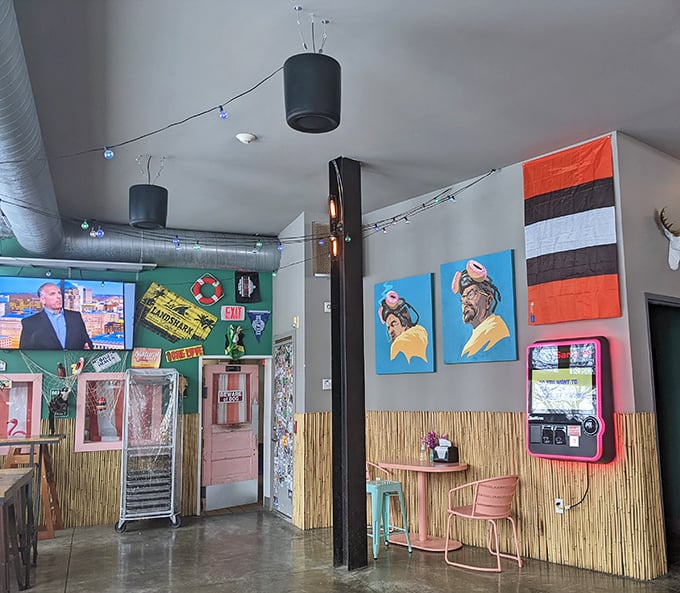 Colorful string lights, yellow chairs, and chrome bar stools create a space that feels like a party where donuts are the guests of honor.