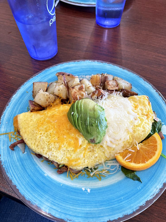 An omelet bursting with enough filling to make a calzone jealous &ndash; this is breakfast with ambition.