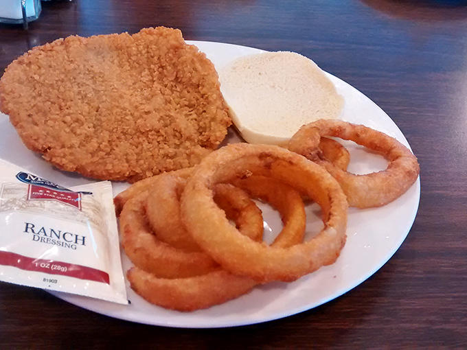 These onion rings aren't just side dishes&mdash;they're golden halos of crispy perfection that deserve their own Instagram account and possibly a small parade.