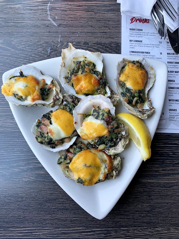 Oysters Rockefeller that would make the Vanderbilts jealous – spinach, bacon, and cheese transforming briny bivalves into decadent treasures.