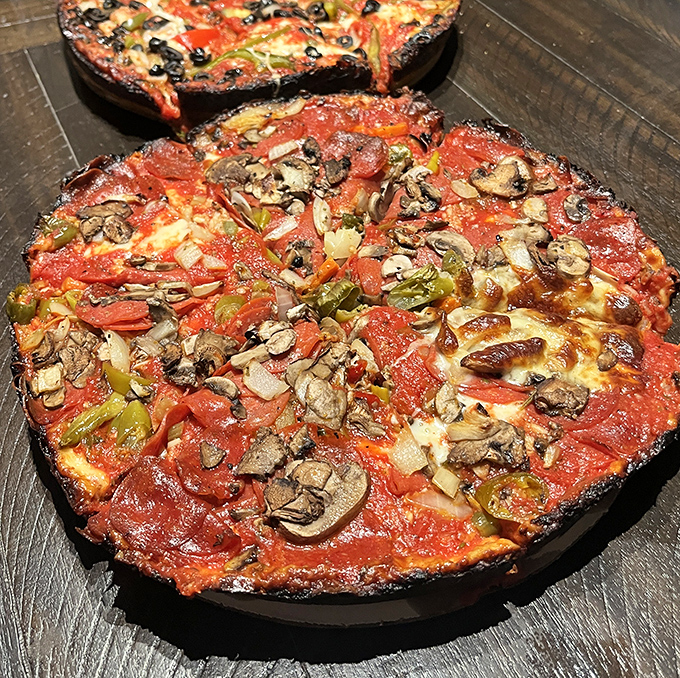 The legendary caramelized crust of a pan pizza&mdash;where cheese meets hot pan and creates that blackened edge that's worth fighting your tablemates for.