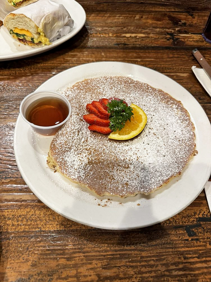 This Swedish pancake, dusted with powdered sugar and adorned with strawberries, is what breakfast dreams are made of. Thin, delicate, and impossibly satisfying. 