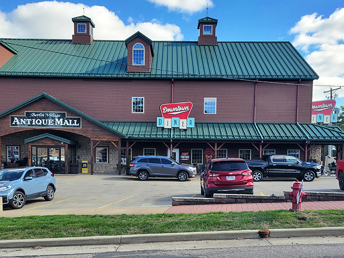 The exterior showcases classic Amish Country architecture with a touch of retro flair. That "Downtown Diner" sign hints at the nostalgic treasures waiting inside.