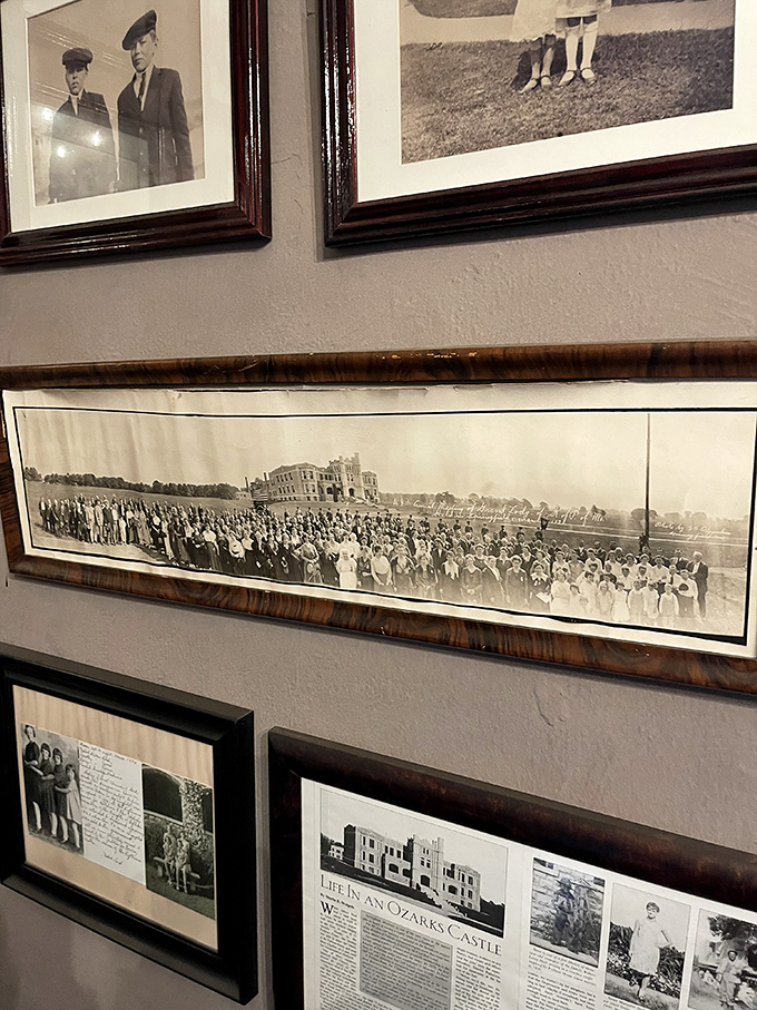 Black and white photographs lining the walls tell visual stories of the castle's fascinating past, from orphanage to military facility to tourist destination.