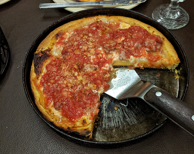 Pan pizza that makes deep dish nervous. That golden crust has the perfect ratio of crunch to chew.