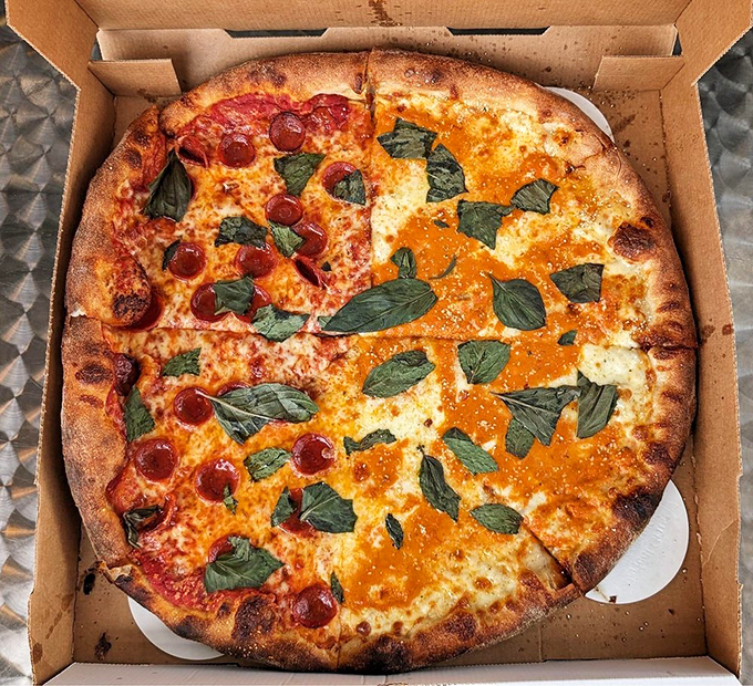 Half pepperoni, half margherita &ndash; the pizza equivalent of having your cake and eating it too, with those fresh basil leaves adding nature's confetti. za