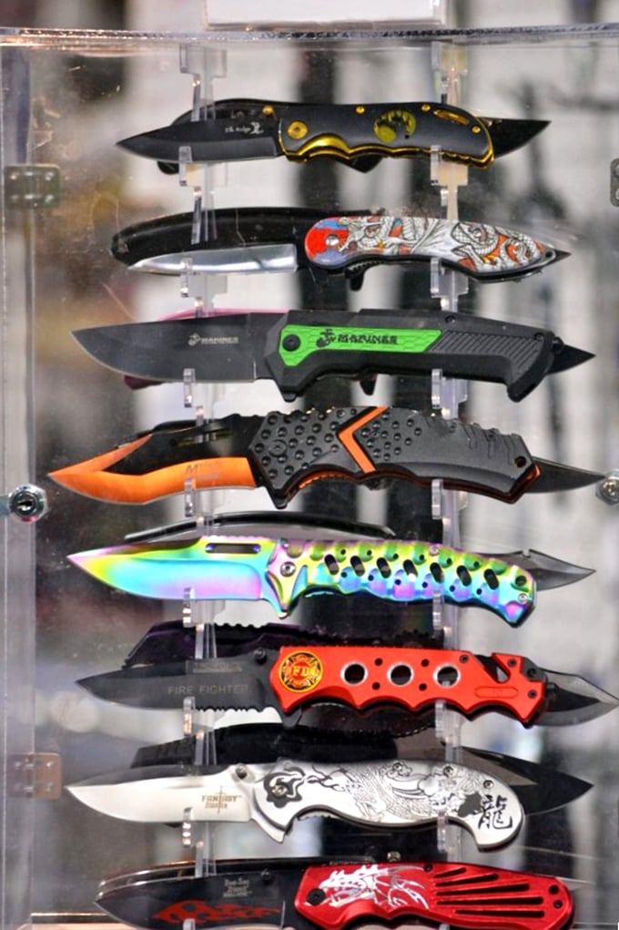 Not your grandfather's pocket knife collection! These colorful blades range from Batman-themed to rainbow finishes&mdash;practical tools with personality to spare.
