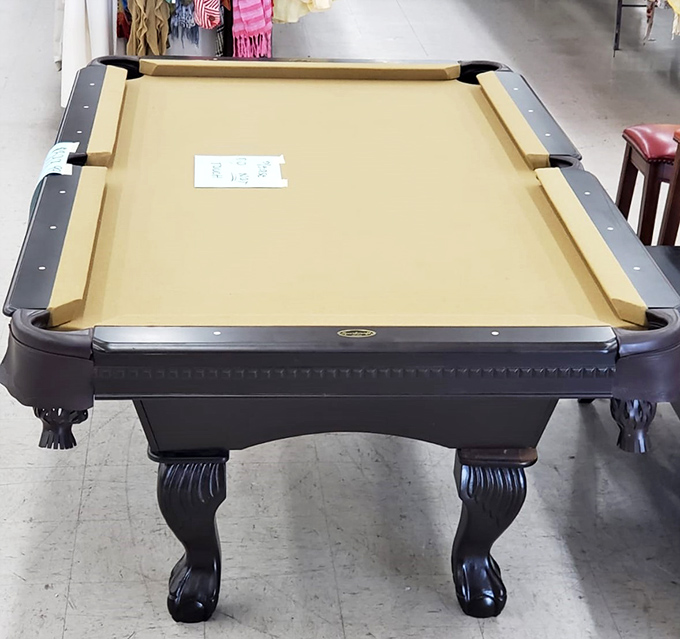 Game night, anyone? This pool table awaits its next match in someone's basement rec room. Solid craftsmanship never goes out of style.