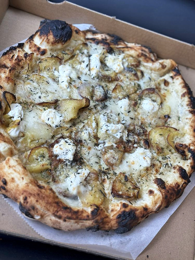 The potato pizza proves that carbs-on-carbs isn't just acceptable&mdash;it's a revelation that will haunt your dreams in the best possible way.