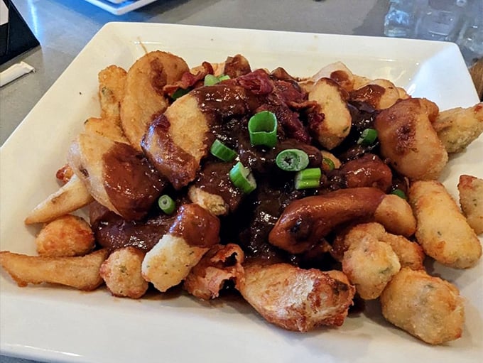 Poutine that could cause international incidents&mdash;crispy fries swimming in gravy with cheese curds playing the role of delicious life preservers.