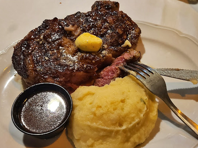 A prime rib so perfectly cooked it should have its own Instagram account, with a side of mashed potatoes that clearly weren't born from a box.