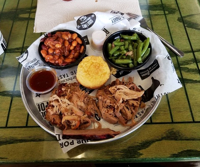 The pulled pork plate&mdash;where meat, beans, and greens come together like the world's most delicious family reunion. Don't forget the cornbread!