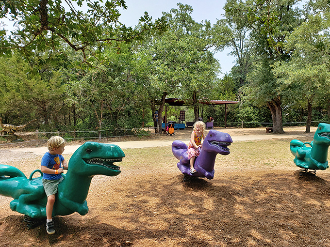 These dino-riders might be the coolest playground equipment in Texas. Jurassic Park meets county fair in the best possible way.