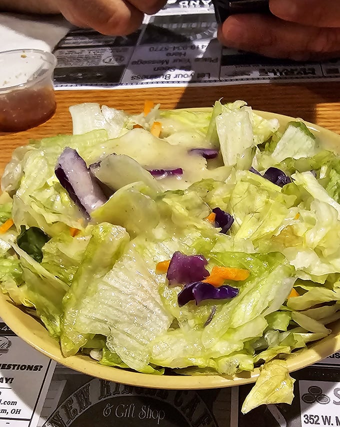 Even the salads here mean business &ndash; fresh greens that actually make you forget about the ribs.
