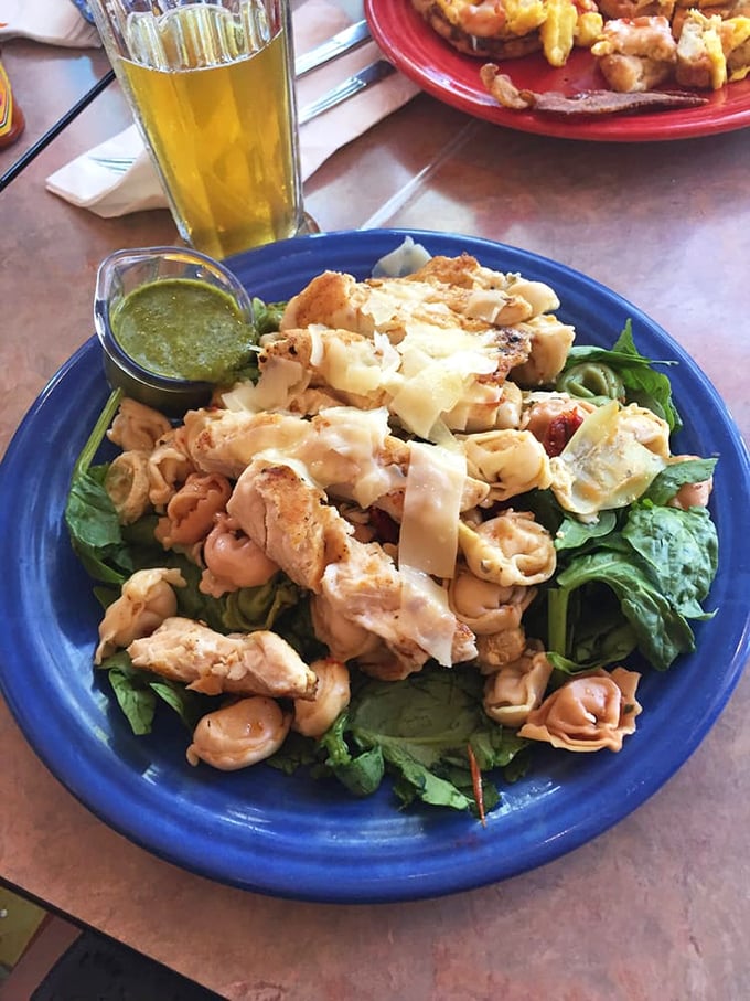 Not just another salad&mdash;this vibrant bowl combines grilled chicken, fresh greens, and house-made dressing in a symphony of textures and flavors.
