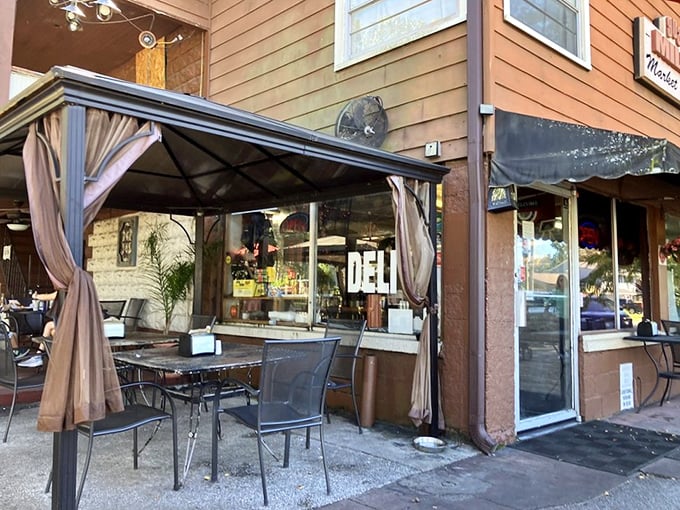 The outdoor seating area offers prime people-watching real estate while you contemplate ordering a second sandwich "for later."