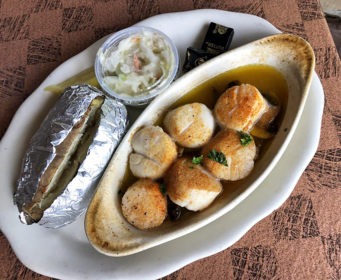 Scallops bathed in butter that glisten like culinary jewels. These aren't just seafood&mdash;they're ocean candy for grown-ups.