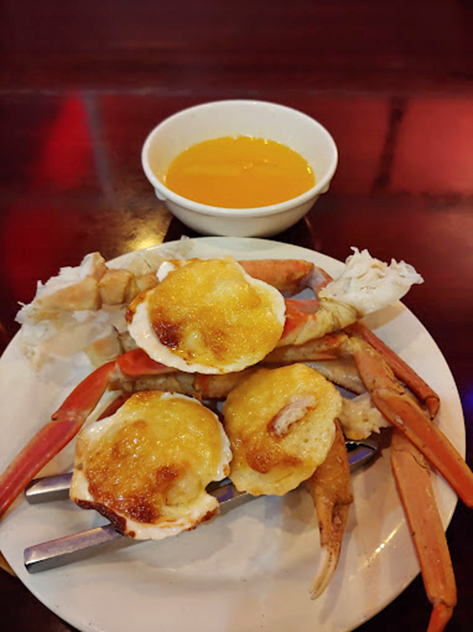 Snow crab legs and scallops broiled to golden perfection&mdash;proof that "all-you-can-eat" and "seafood worth eating" aren't mutually exclusive concepts.