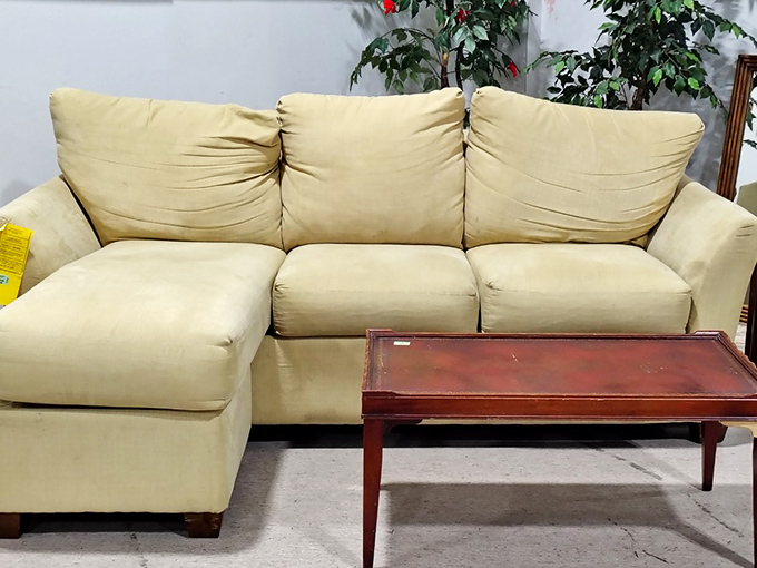 This sectional sofa has stories to tell. With its neutral palette and generous proportions, it's ready for its second act in someone's living room drama.