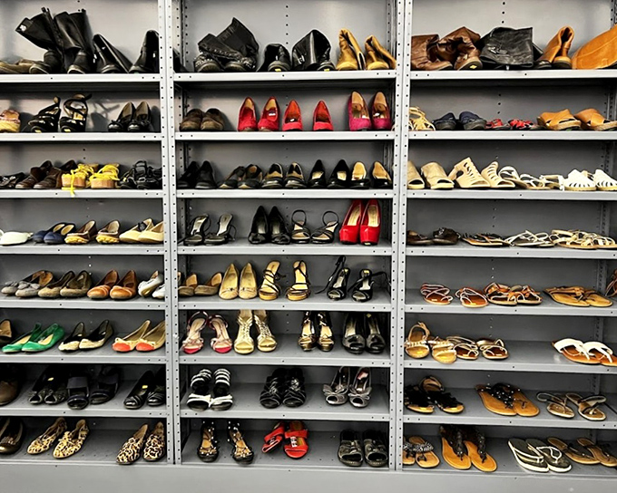 The shoe section: a perfectly organized footwear library where someone's barely-worn splurge becomes your brilliant bargain find.