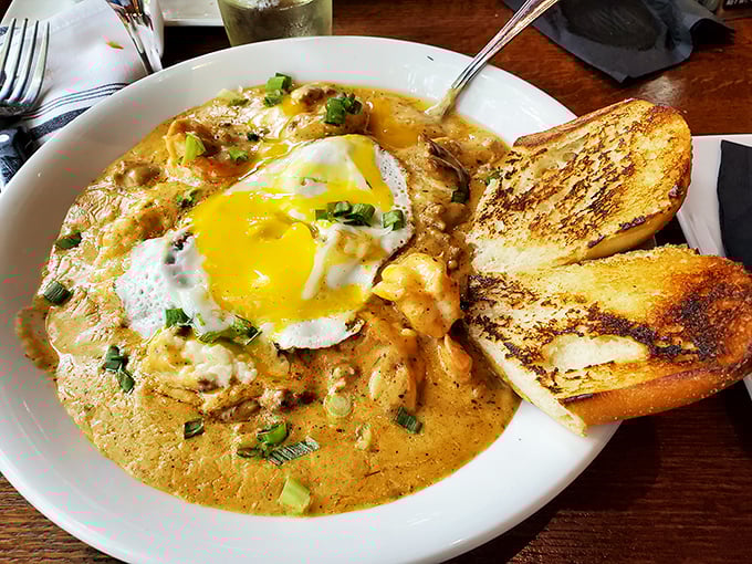 Shrimp and grits that would make a Charlestonian weep with joy. That sunny-side egg on top? The breakfast-for-dinner plot twist we all need.