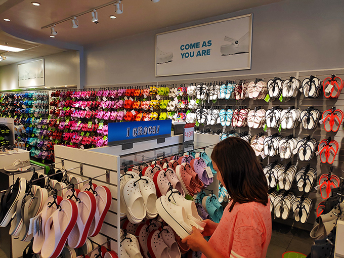 A rainbow of Crocs creates a hypnotic display that challenges even the most disciplined shopper. "Just one pair" becomes "but they're practically giving them away!"