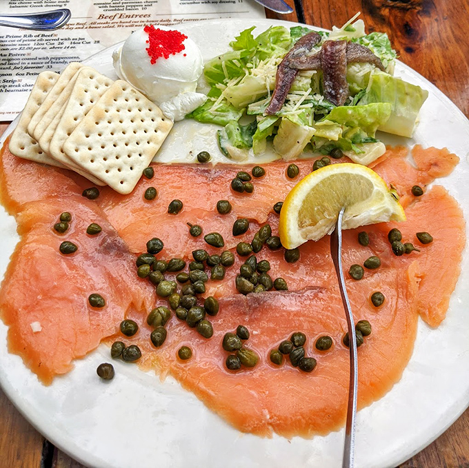 Smoked salmon with capers&mdash;the sophisticated cousin at the family reunion of appetizers. Those crackers are just transportation vehicles for deliciousness.